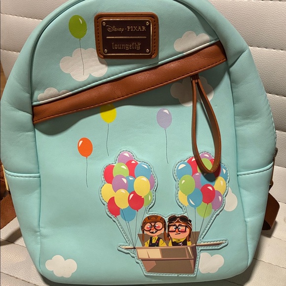 Loungefly | Bags | Loungefly Light Blue Backpack With Colorful Balloons ...
